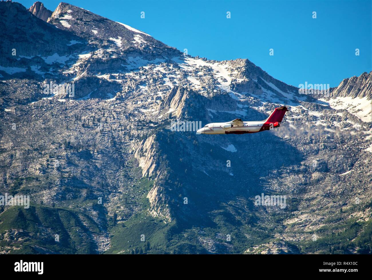 Slurry bombers (planes and jets) fight wildfires from the air by ...