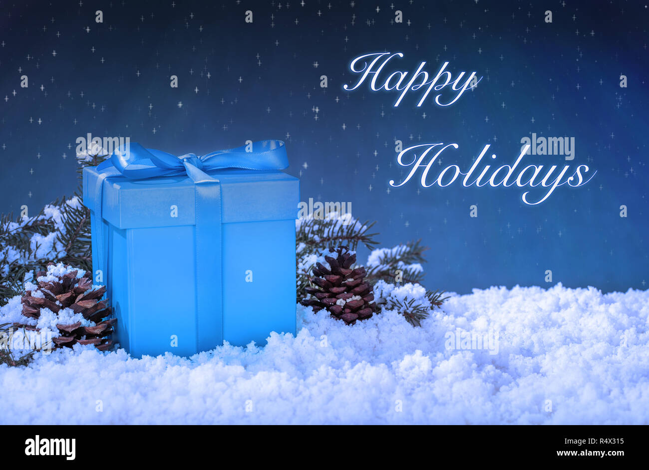 Happy holidays text on gift hi-res stock photography and images - Alamy