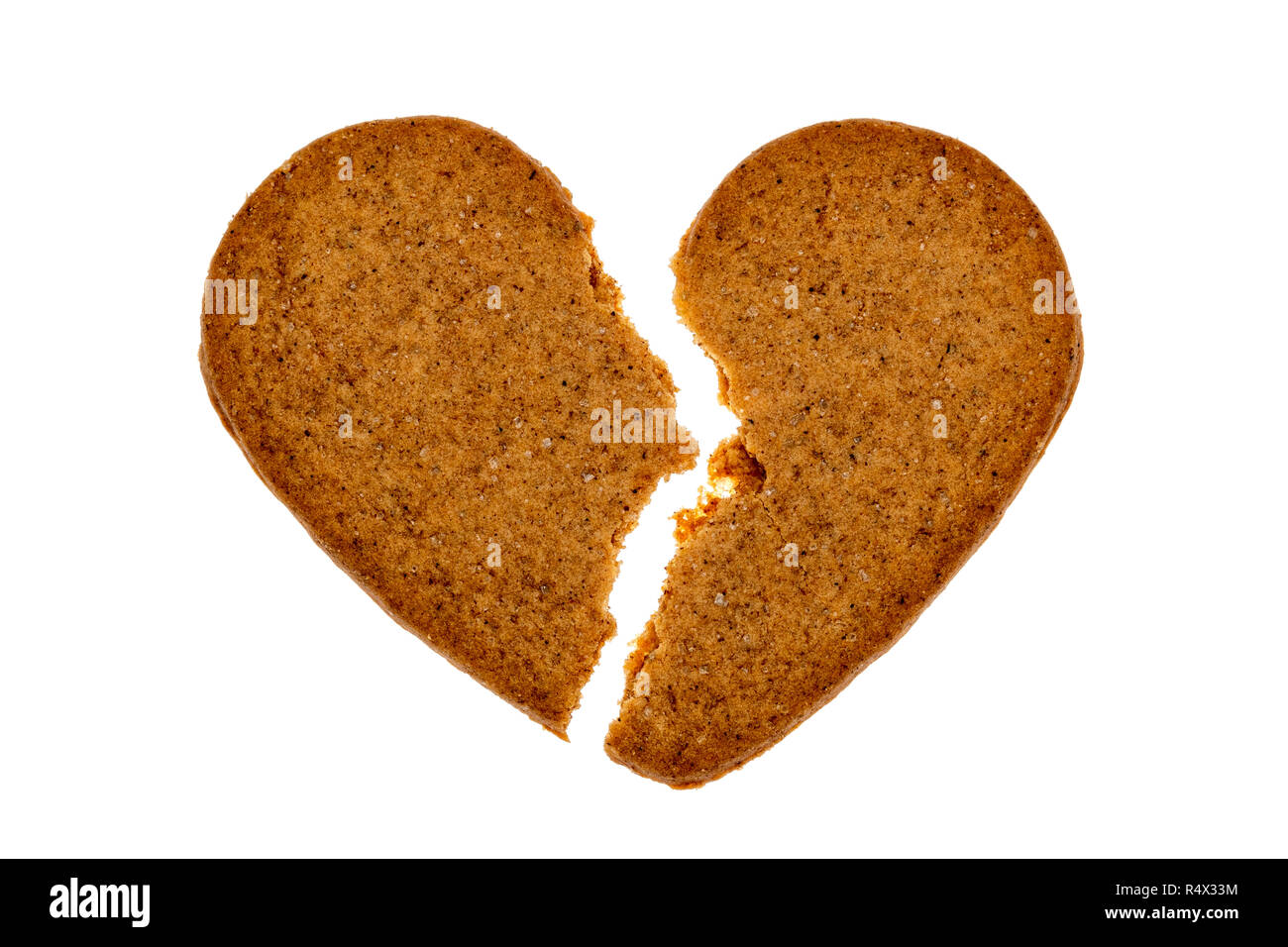 Broken gingerbread heart isolated on white background Stock Photo - Alamy