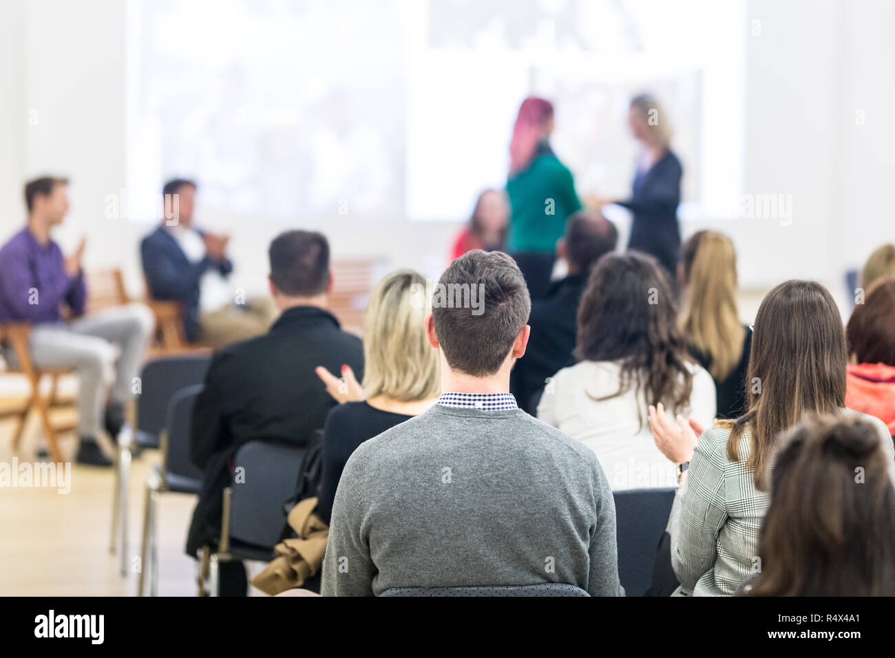 Business speakers giving a talk at business conference event Stock ...