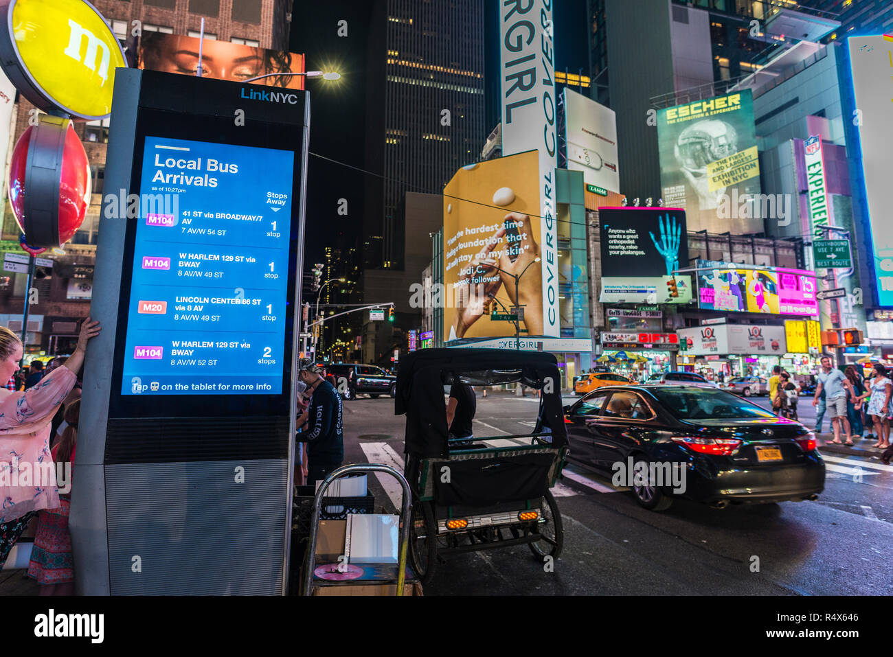 New York City, USA - July 30, 2018: Shops at night on Seventh Avenue ...