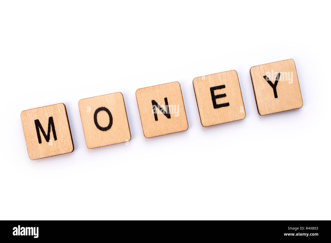 The word MONEY spelt with wooden letter tiles Stock Photo - Alamy