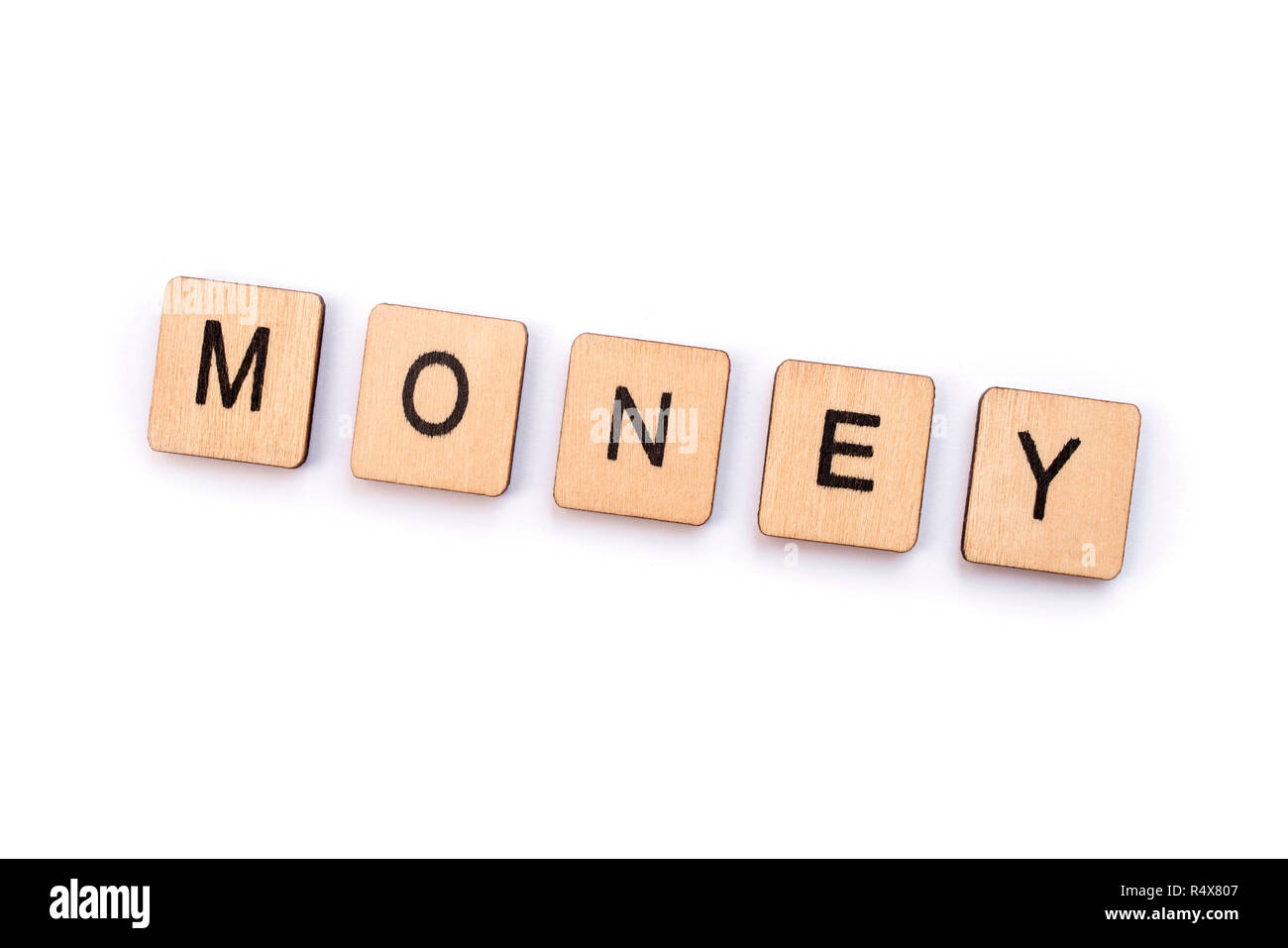 The word MONEY spelt with wooden letter tiles Stock Photo - Alamy