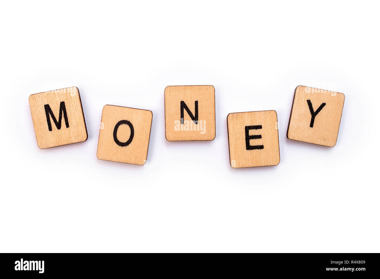 The word MONEY spelt with wooden letter tiles Stock Photo - Alamy