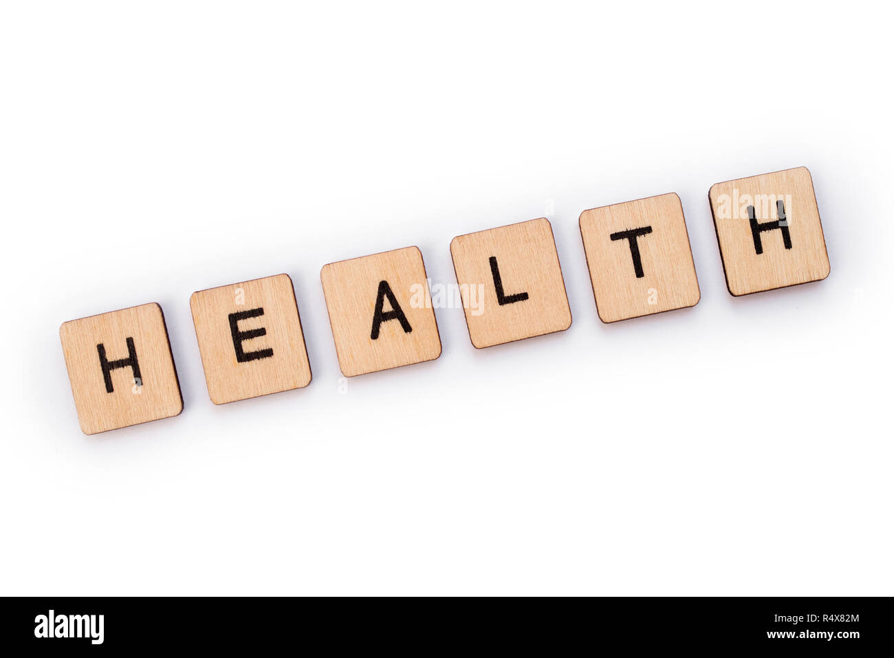 The word HEALTH spelt with wooden letter tiles Stock Photo - Alamy