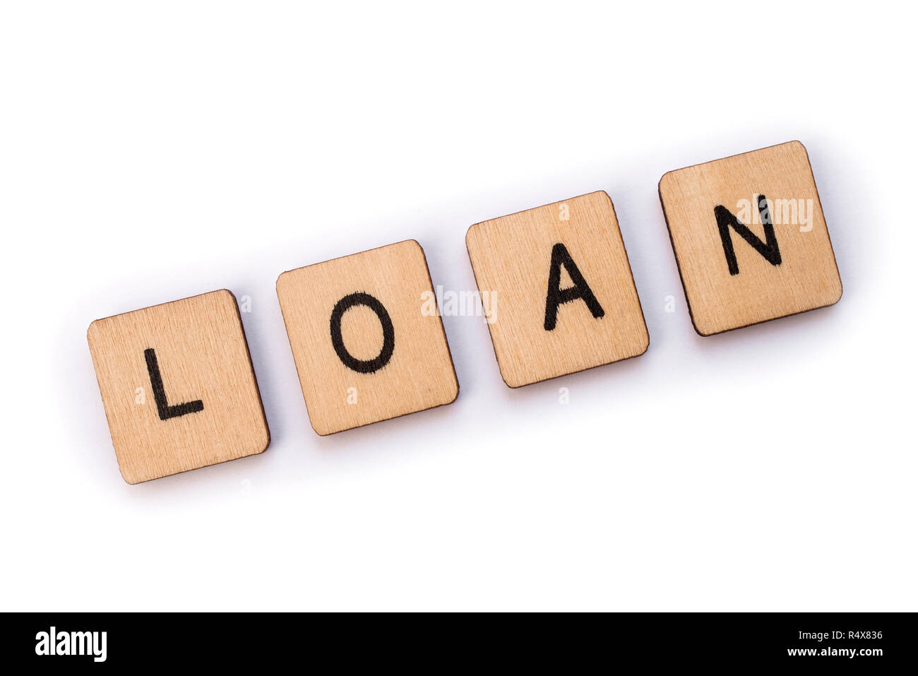 The word LOAN spelt with wooden letter tiles Stock Photo - Alamy