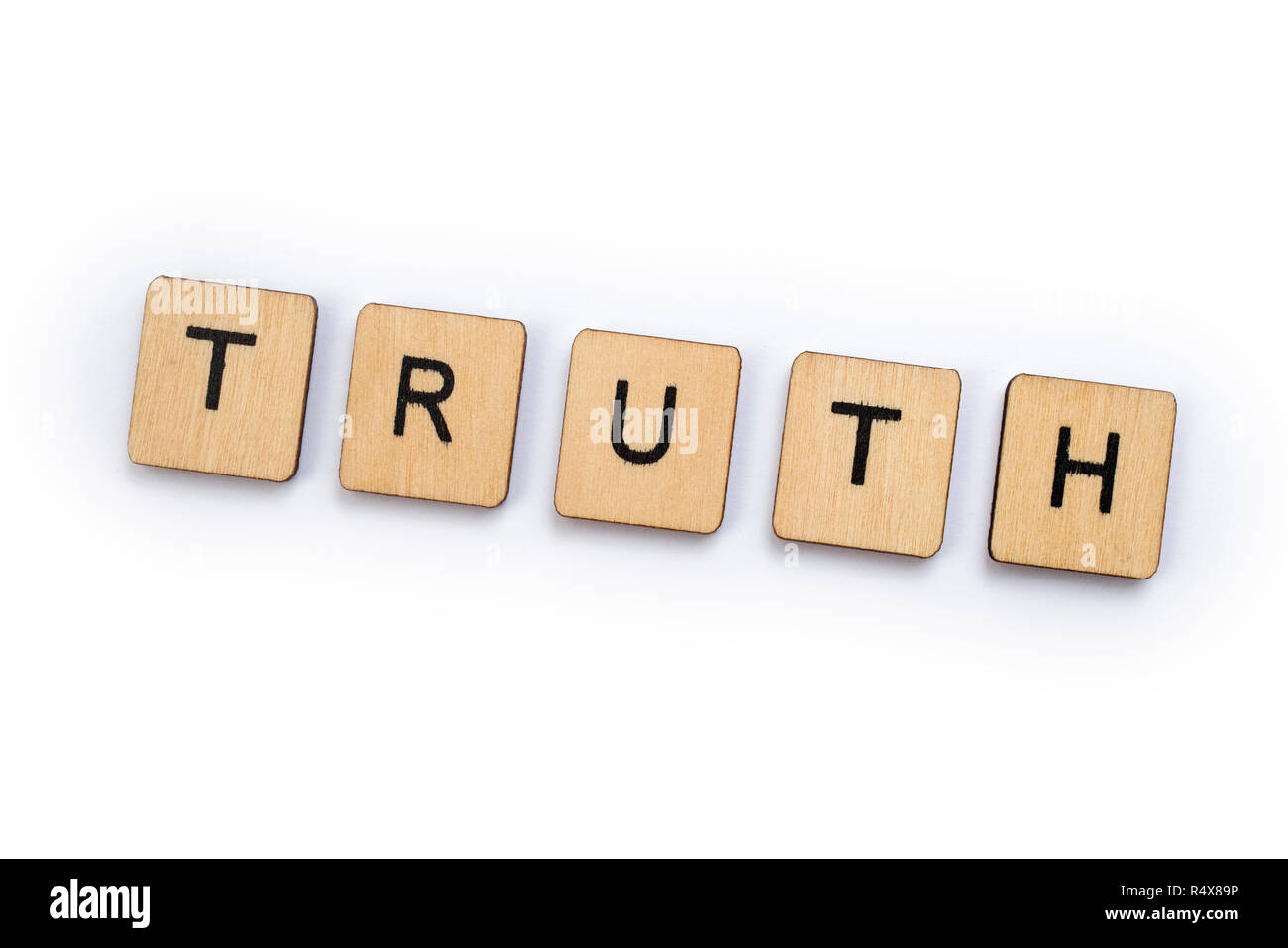 The word TRUTH, spelt with wooden letter tiles Stock Photo - Alamy