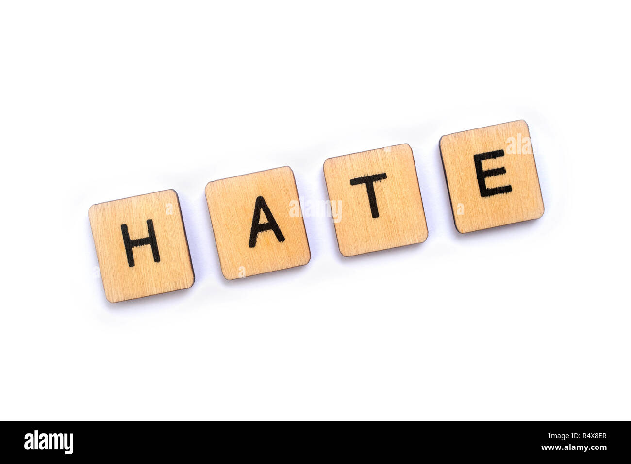 The word HATE, spelt with wooden letter tiles Stock Photo - Alamy