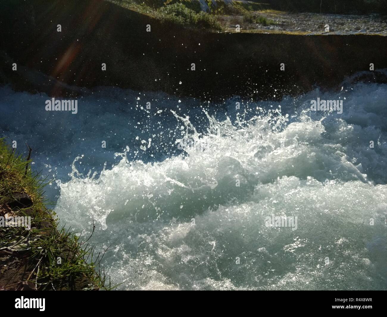 Water splashing and squirting after Ticinazzo sluice waterfall ...