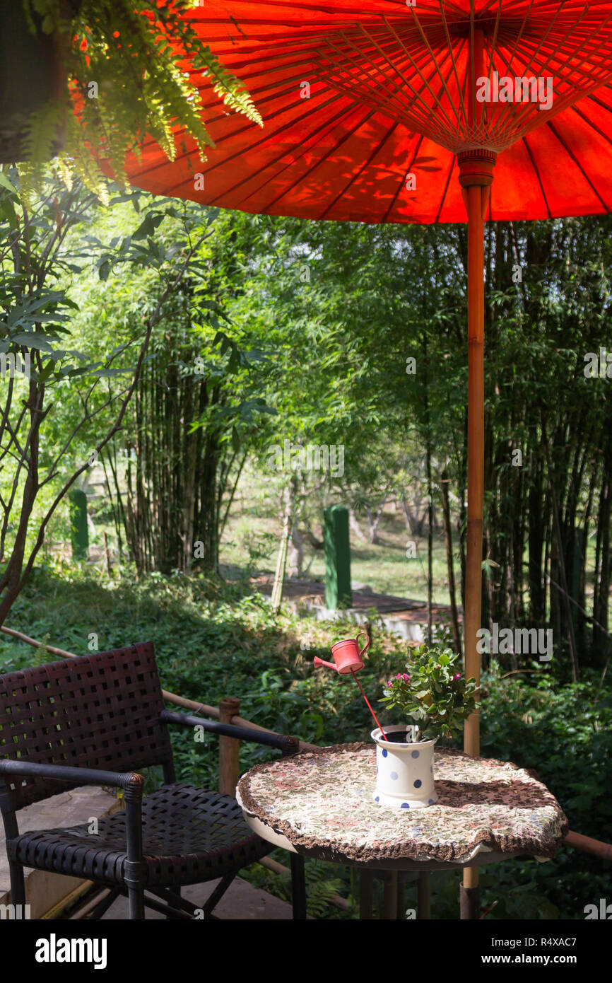 Outdoor Table And Chair In Garden Stock Photo - Alamy