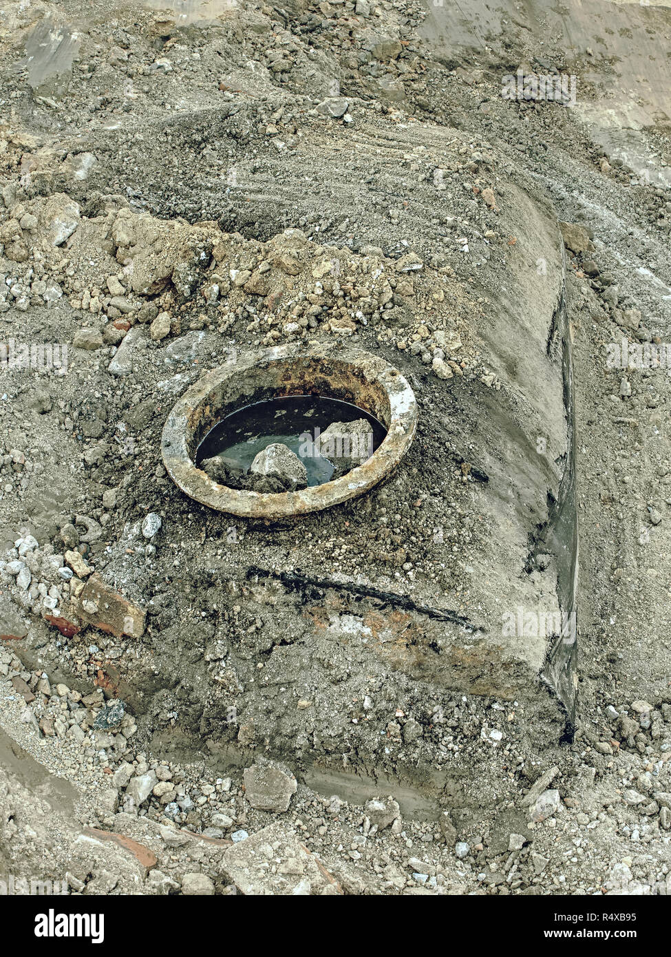 Old sewer covers after exchange. Drainage sewer manhole. Rebuilding of ...