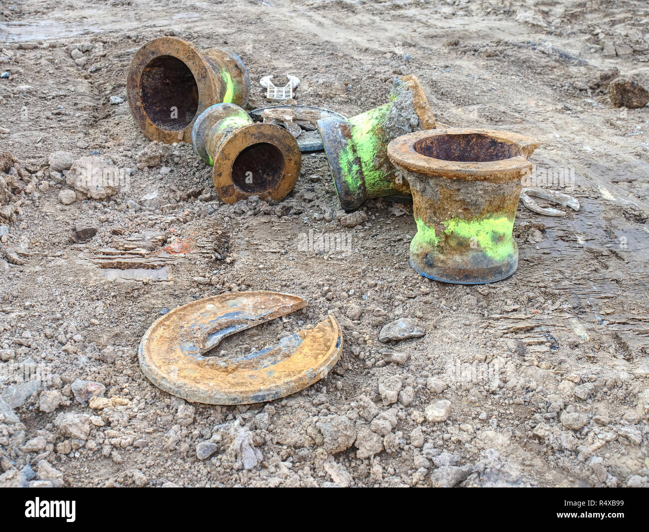 Old sewer covers after exchange. Drainage sewer manhole. Rebuilding of ...