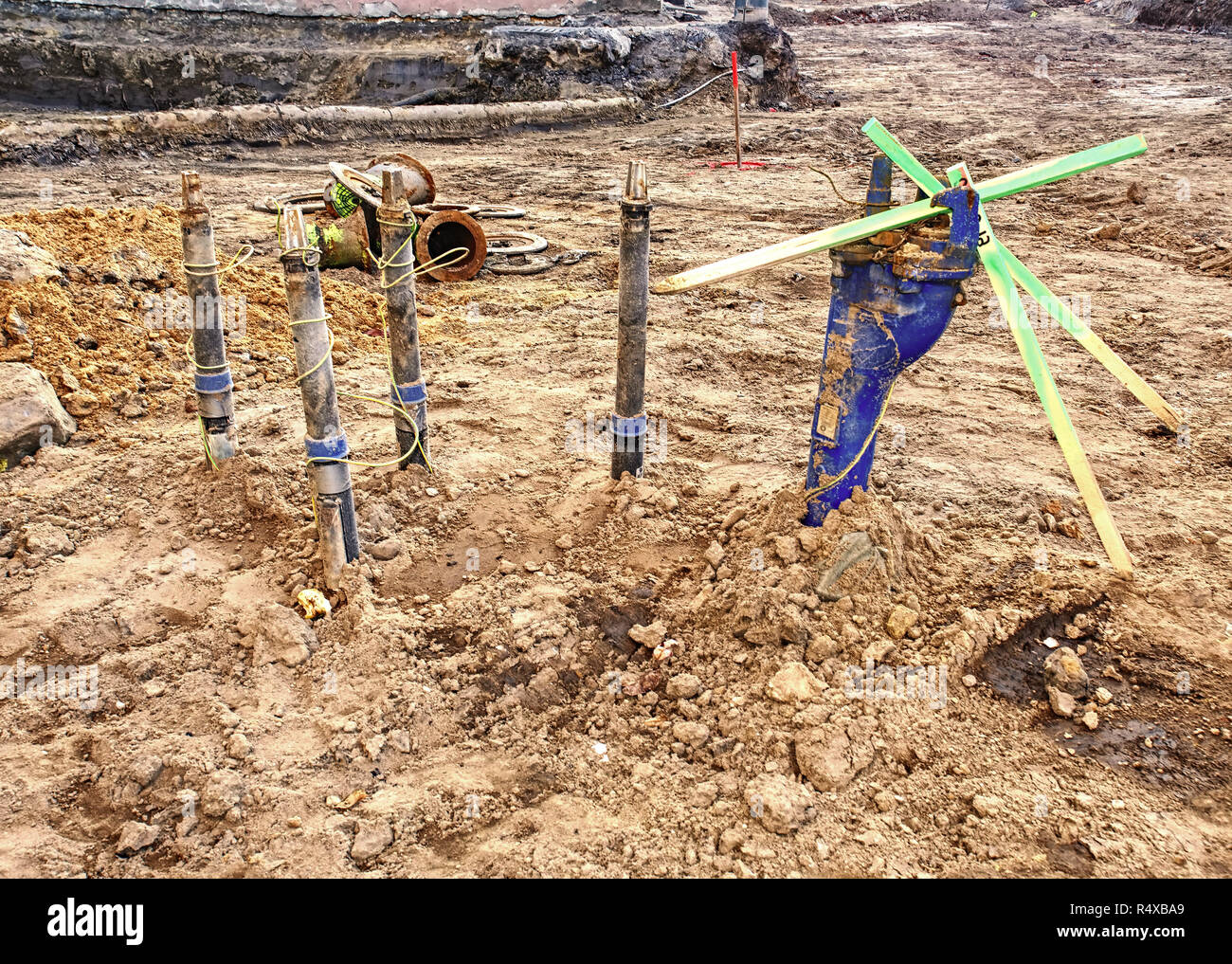 Building of new potable water tap in town street, maintenance work, dig ...