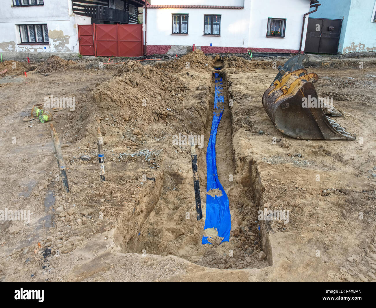 New water pipes tap between main water tube and house. Rebuilding of ...