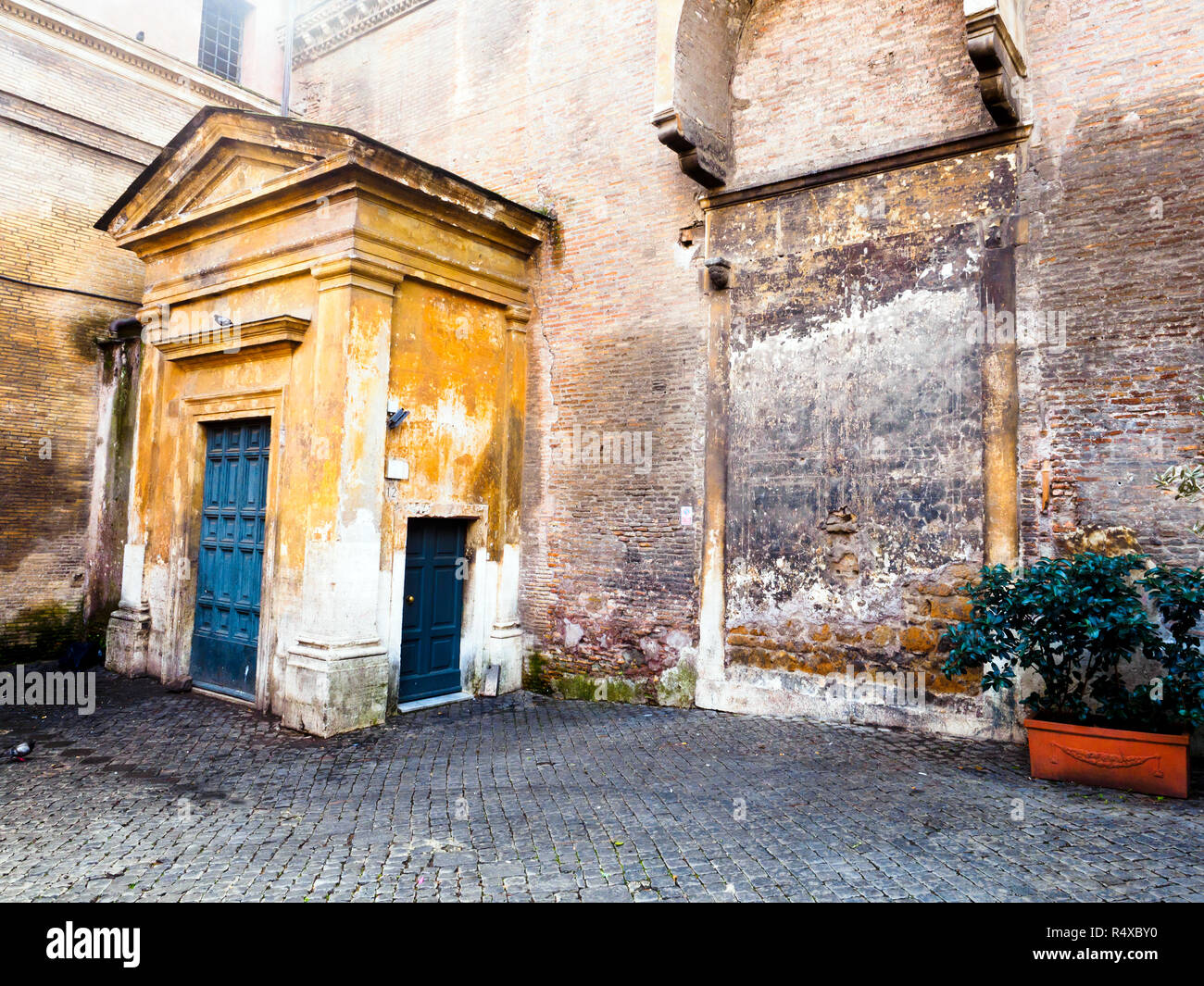 Lateral entrance of Santa Maria in Trastevere Basilica - Rome, Italy ...