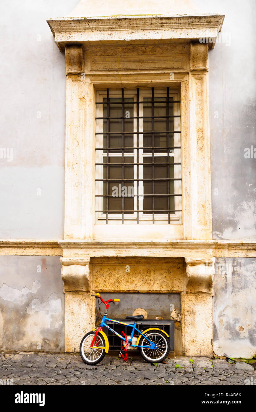 Kid Bicycle under a window in Trastevere - Rome, Italy Stock Photo - Alamy