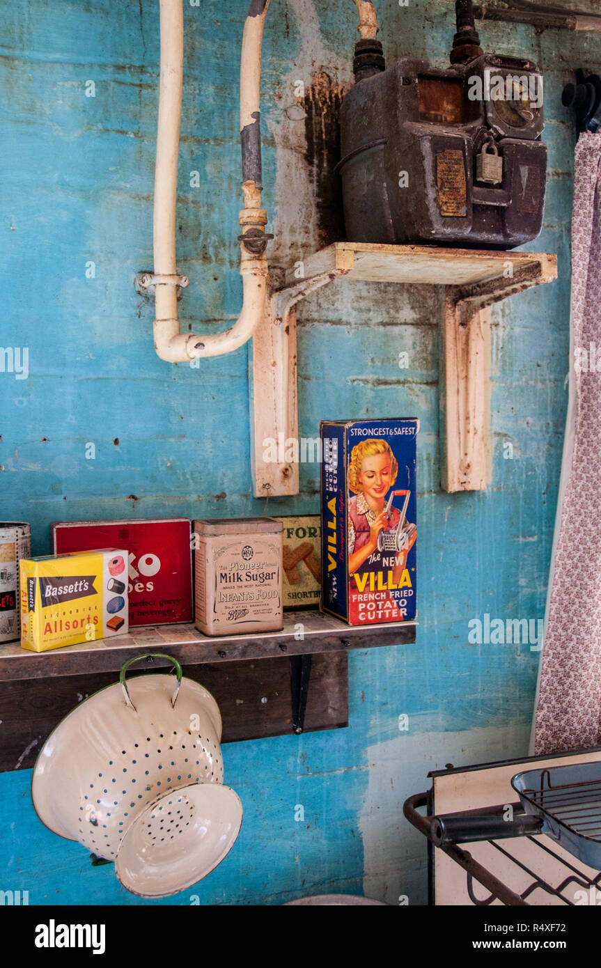 old fashioned wartime kitchen shelf and gas meter Stock Photo - Alamy