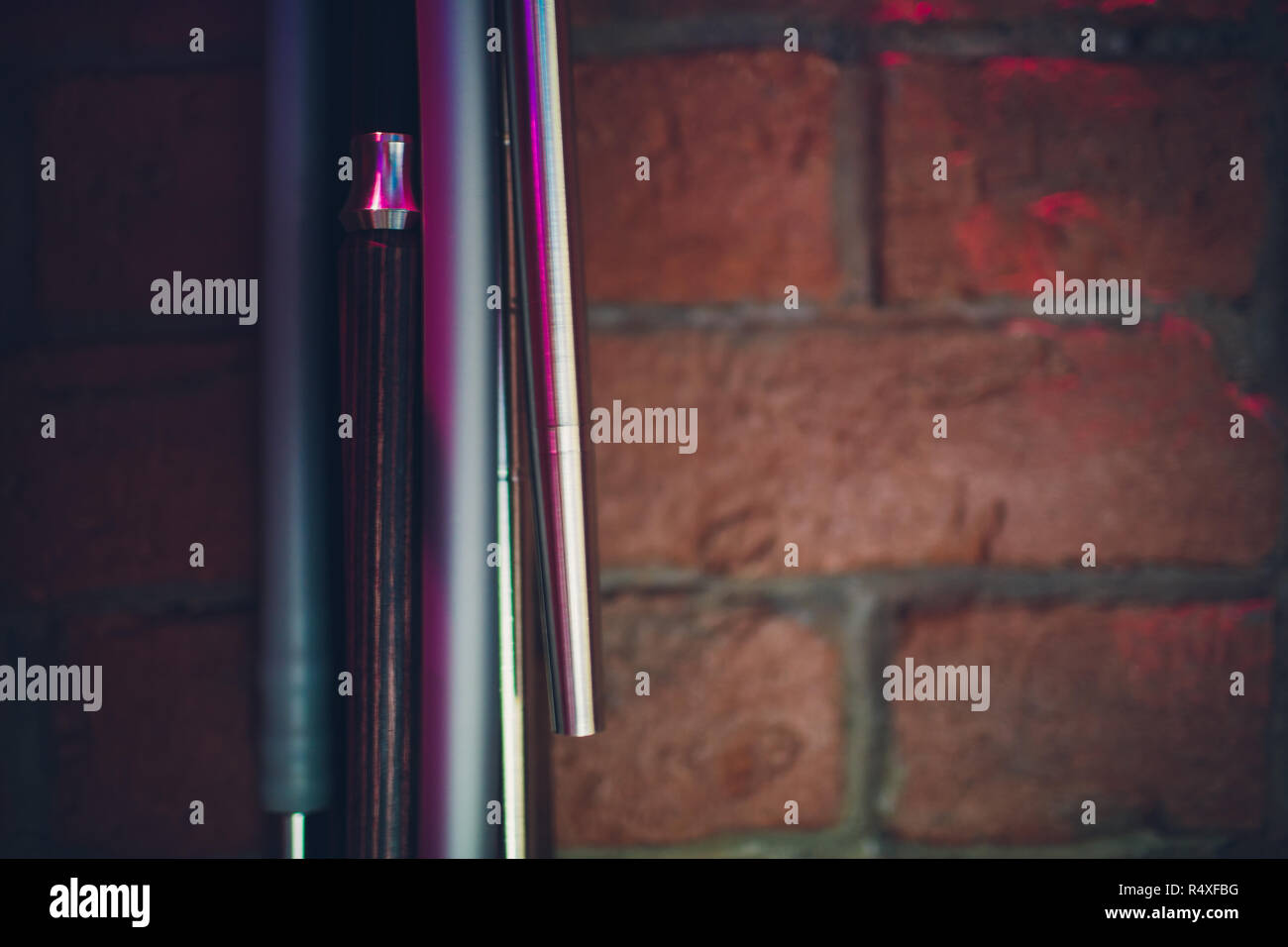 Oriental hookah. Shisha Concept iron mouthpiece on brick background ...