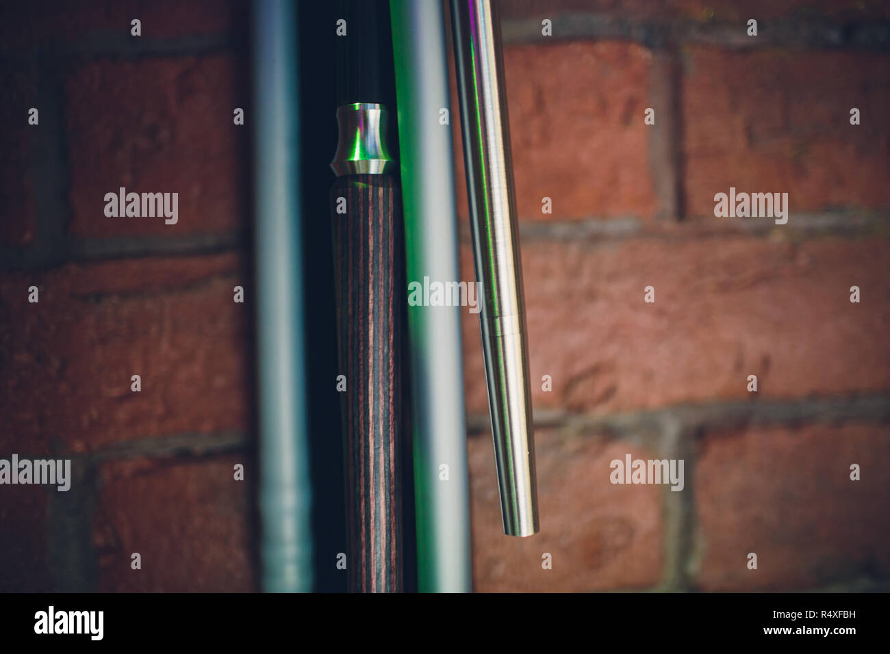 Oriental hookah. Shisha Concept iron mouthpiece on brick background ...