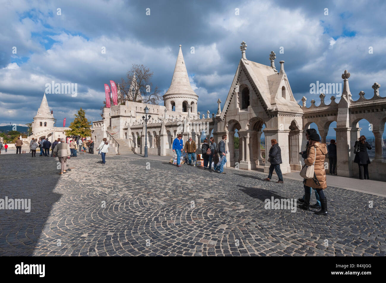 Budapest - tourists explore the Halászbástya or Fisherman's Bastion ...