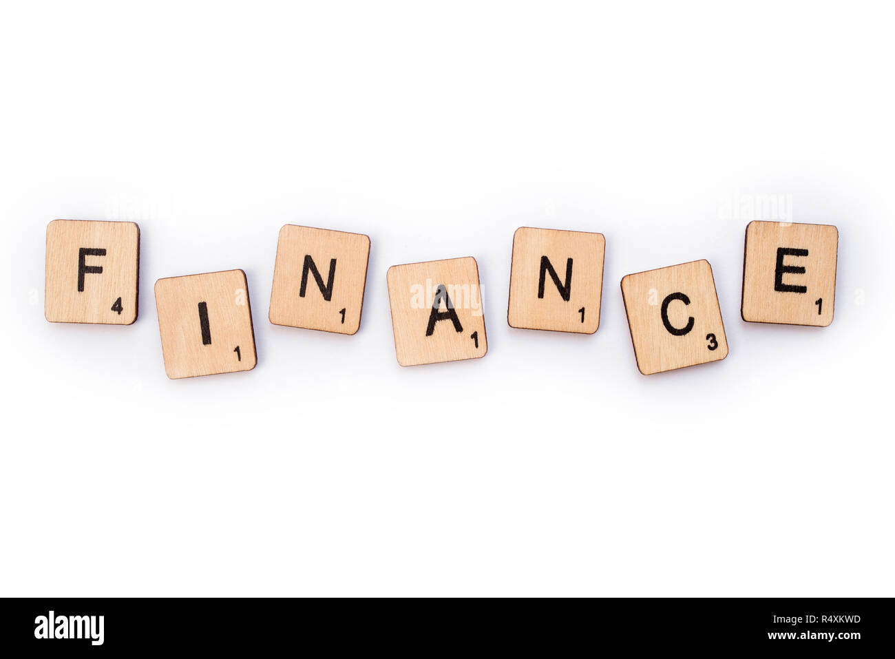 LONDON, UK - JULY 5TH 2018: The word FINANCE spelt with wooden letter ...