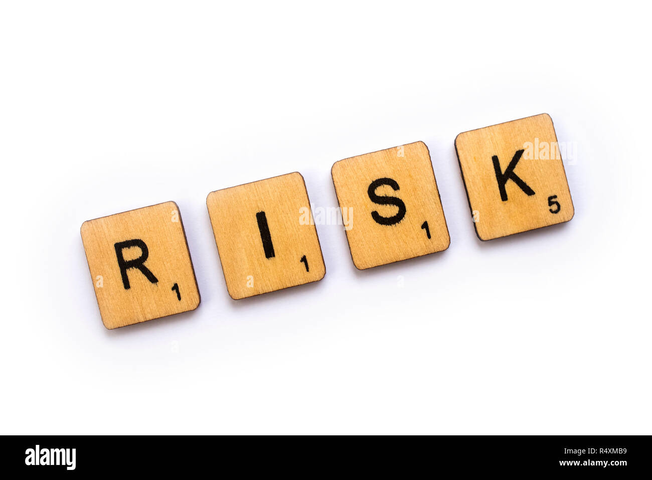 LONDON, UK - JULY 5TH 2018: The word RISK, spelt with wooden letter ...