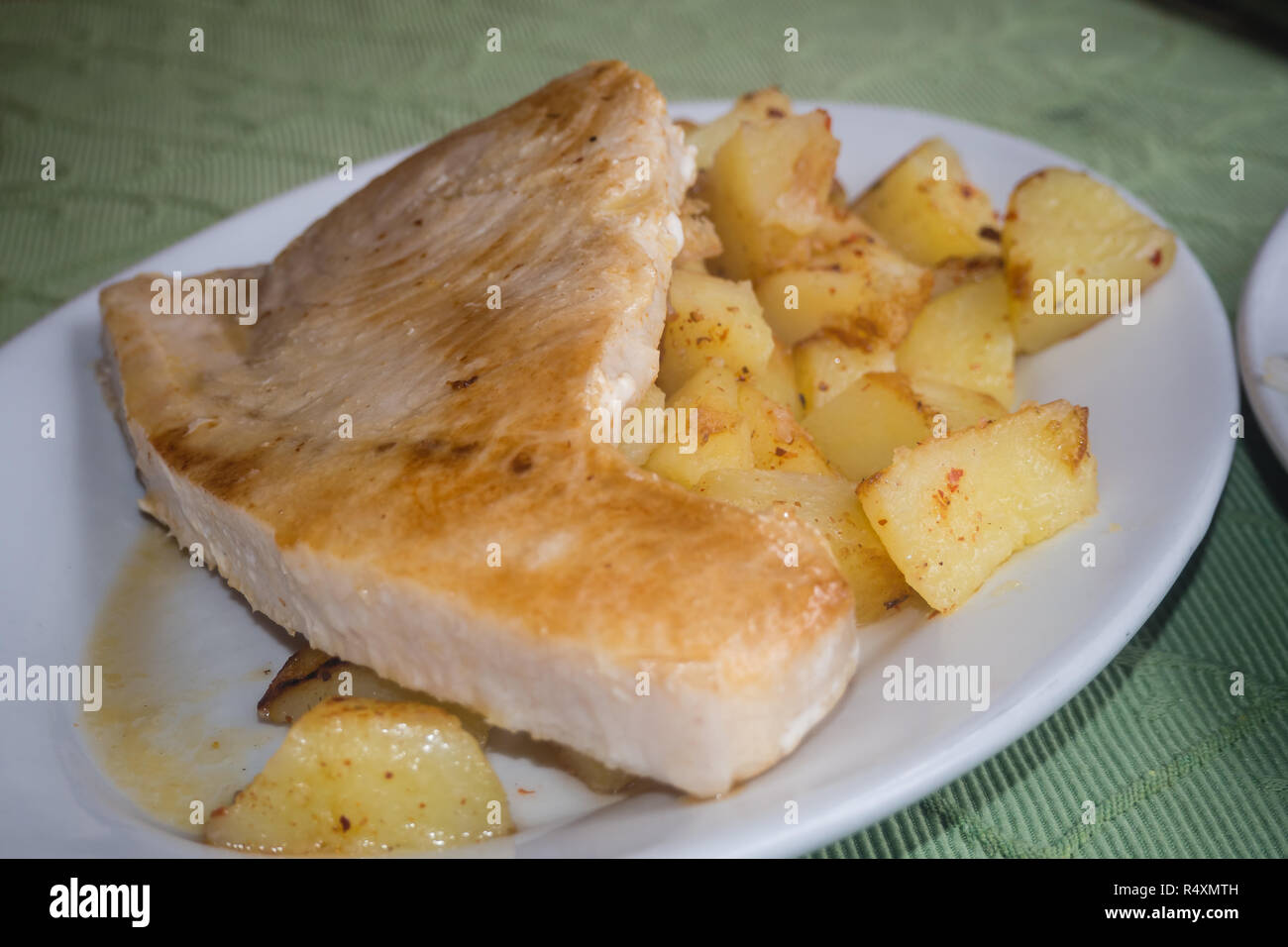 Tuna fish with fries potatoes in Chile Stock Photo - Alamy