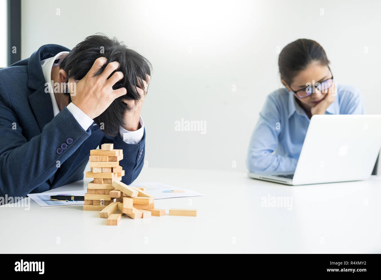 Depressed failure and tired businessman late sad and solving problem in ...