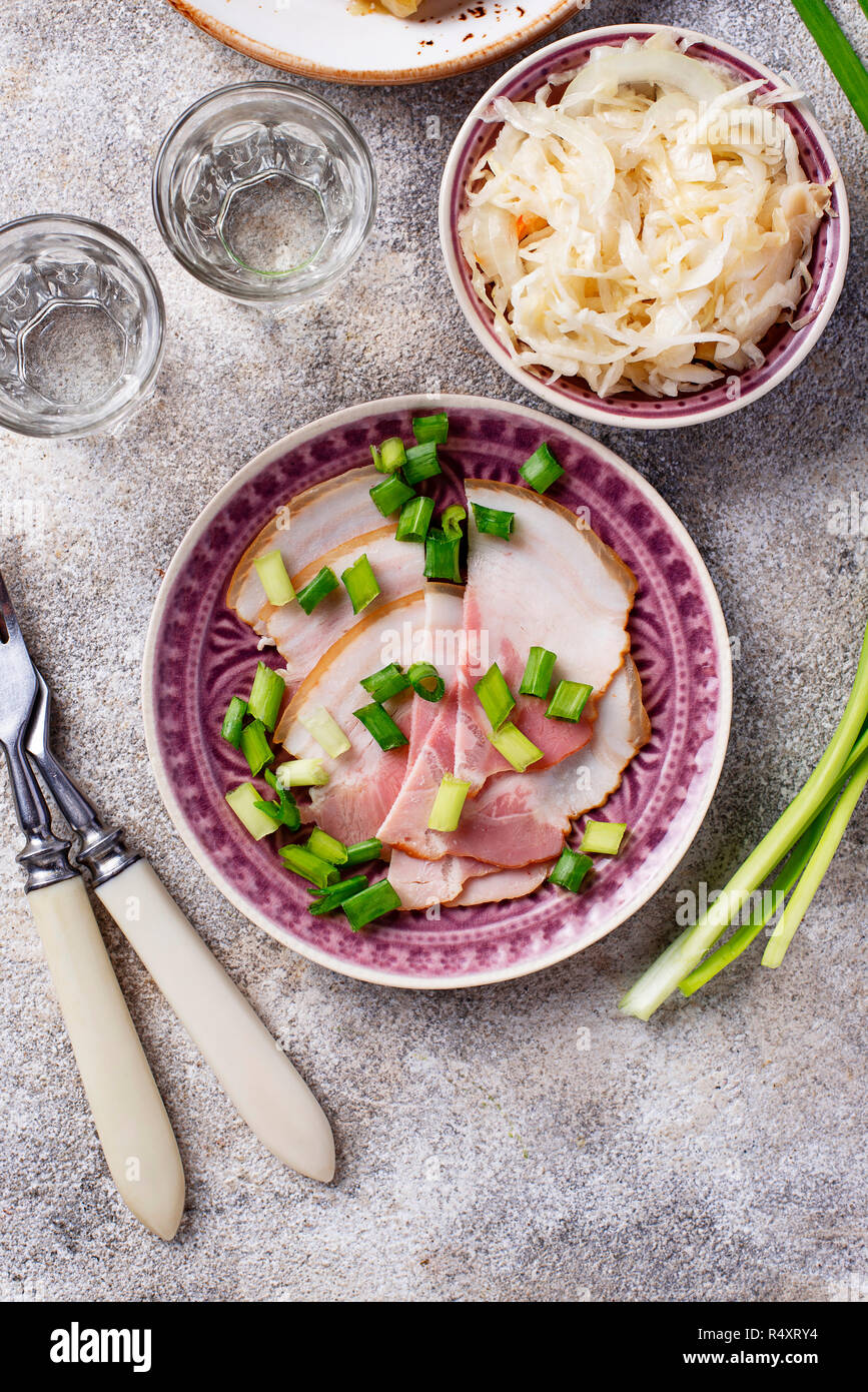 Traditional Russian and Ukrainian appetizers for vodka. Bacon and ...