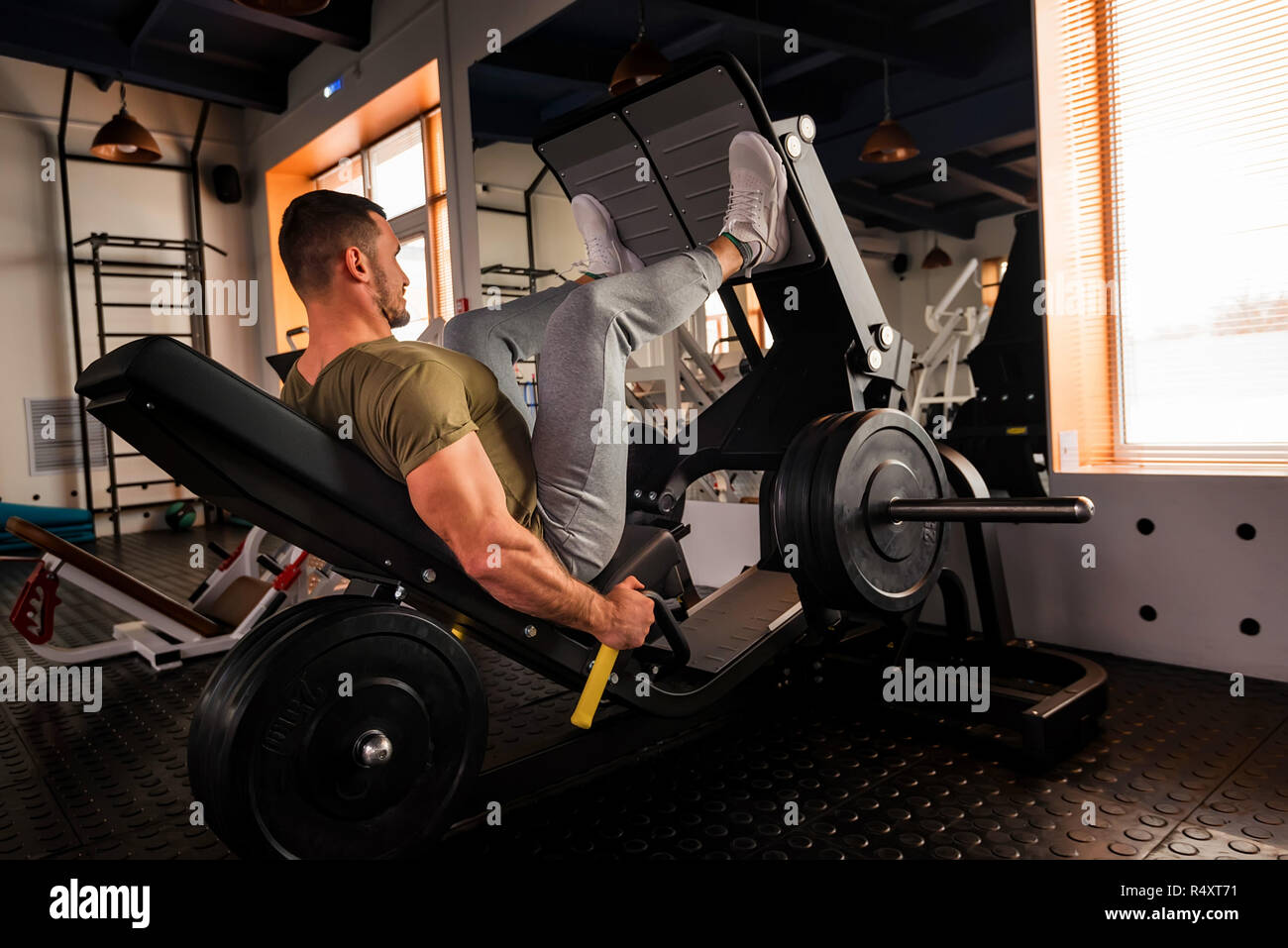 Man leg press back not woman hi-res stock photography and images - Alamy