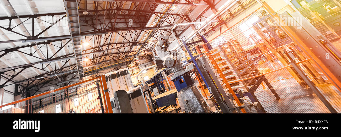 Fiberglass production industry equipment at manufacture background ...