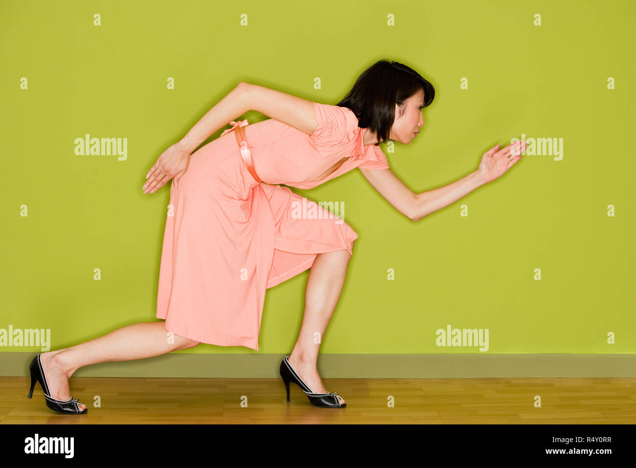 Striding position hi-res stock photography and images - Alamy