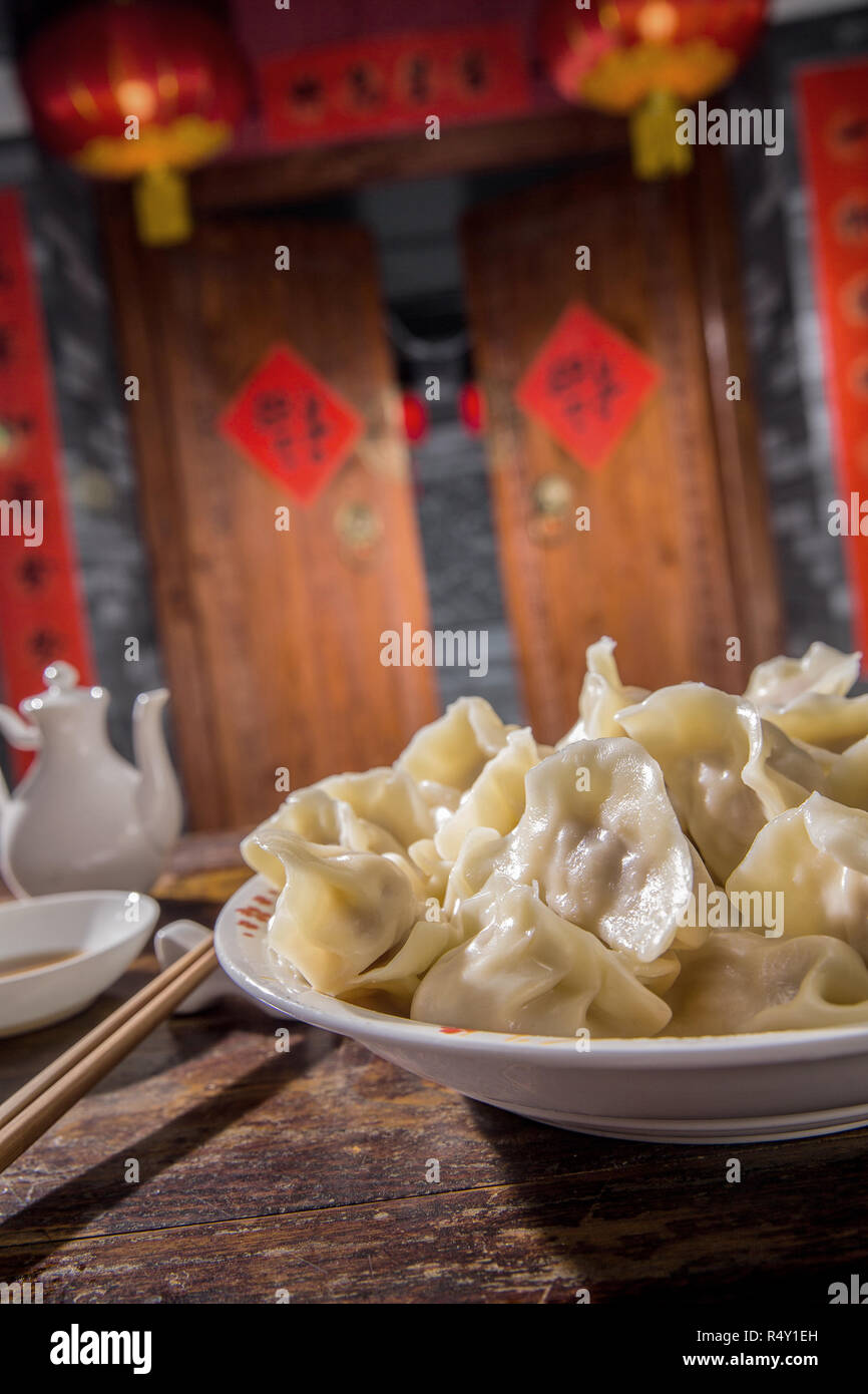 Chinese family eating dumplings hi-res stock photography and images - Alamy