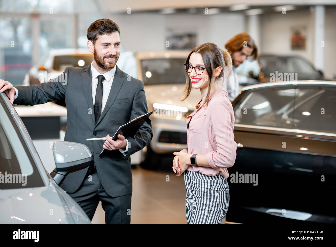 A Car Salesman And Customer