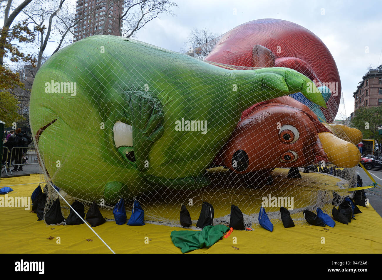 Workers are seen filling parade baloons with helium during the 92nd ...