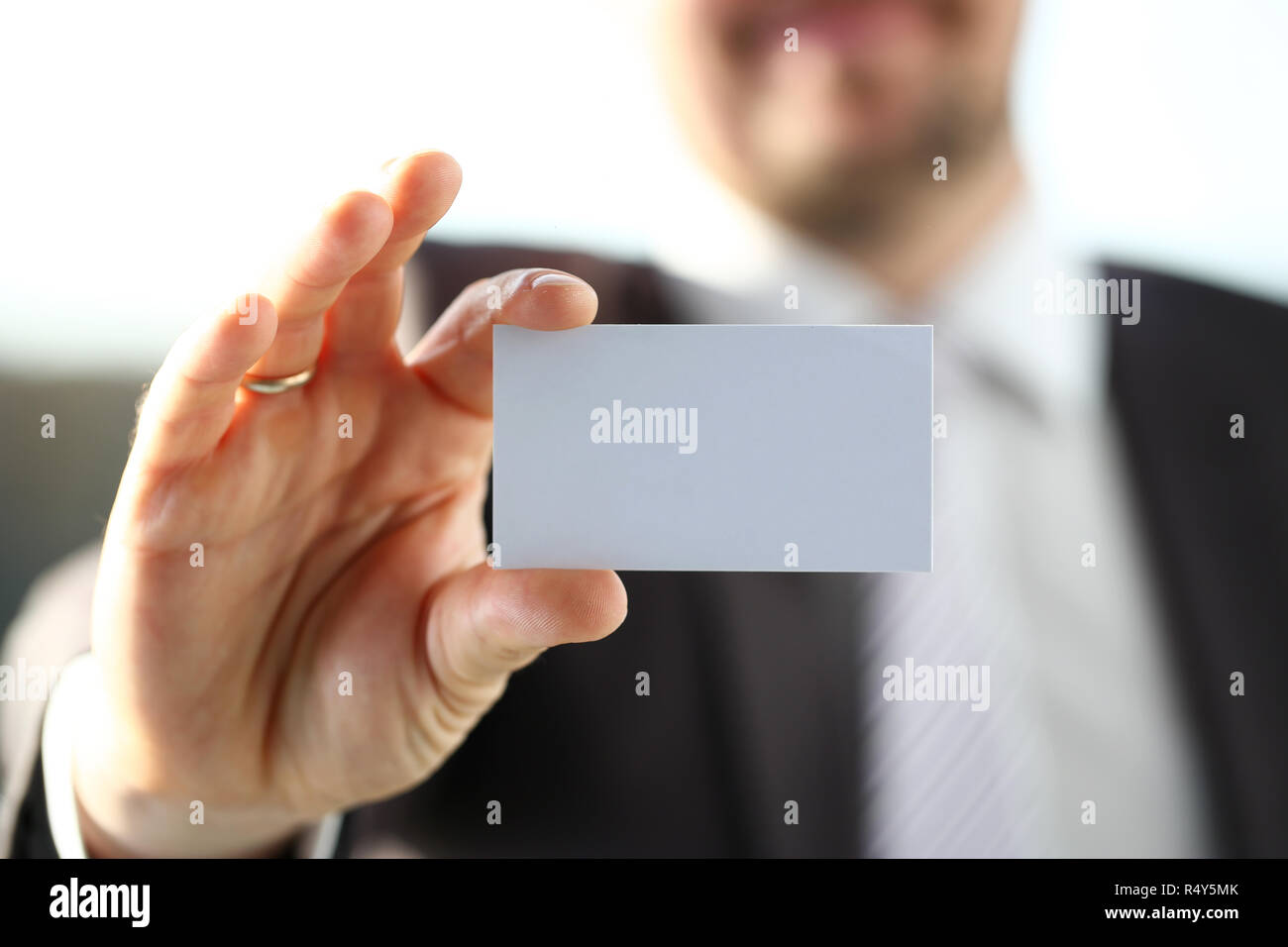 Male arm in suit give blank calling card Stock Photo - Alamy