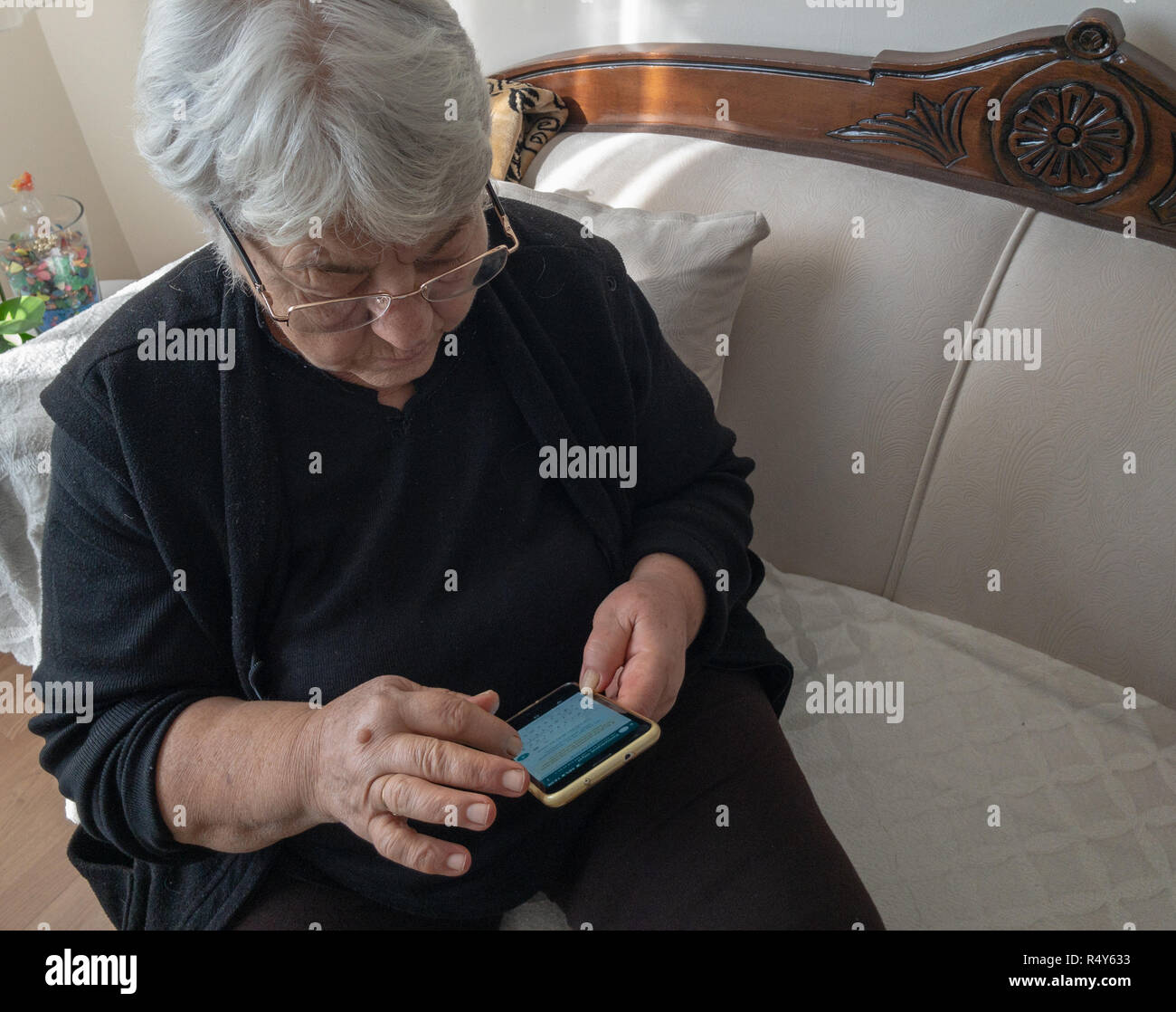 Old woman technology hi-res stock photography and images - Alamy