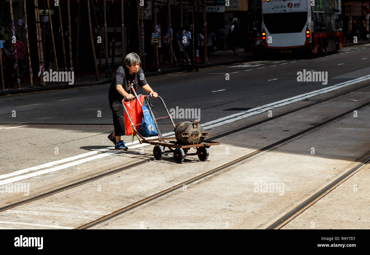 Pushing a heavy load hi-res stock photography and images - Alamy