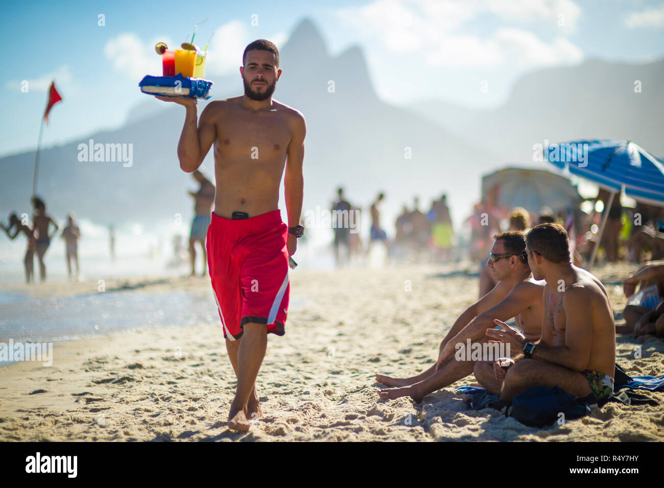 RIO DE JANEIRO - FEBRUARY, 2018: An unlicensed Brazilian beach vendor ...
