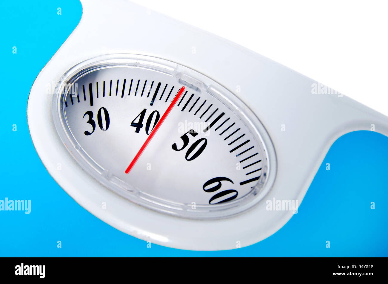 blue scales isolated on a white background Stock Photo - Alamy