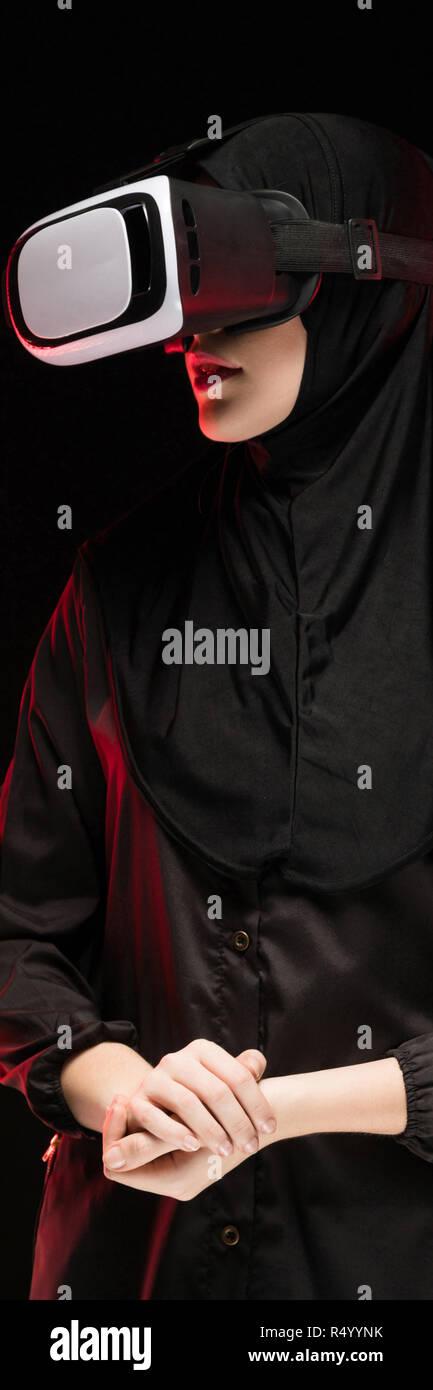 Portrait of beautiful smart young muslim woman wearing black hijab ...