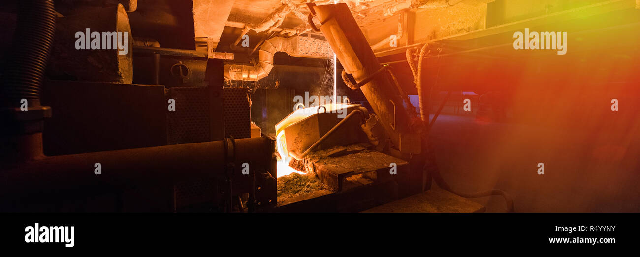 Process of fiberglass production at manufacture background with ...