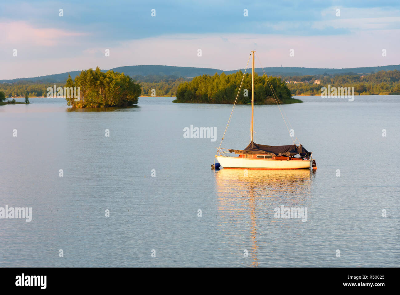 Yacht on the Pogoria IV lake at sunset, Dabrowa Gornicza, Poland Stock ...