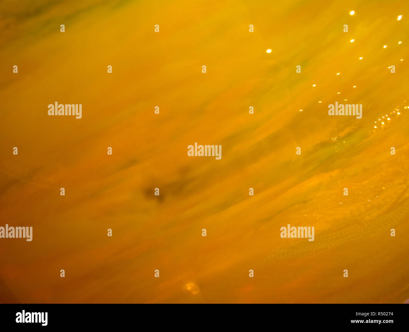 Inside of yellow crystal ball Stock Photo - Alamy