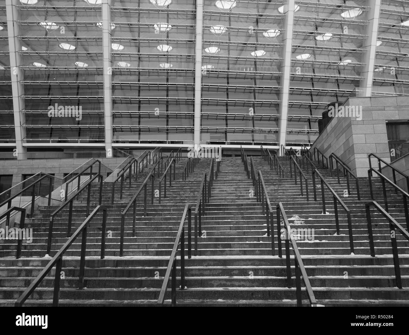 black and white shot of empty stairs to stadium. outdoor monochrome ...