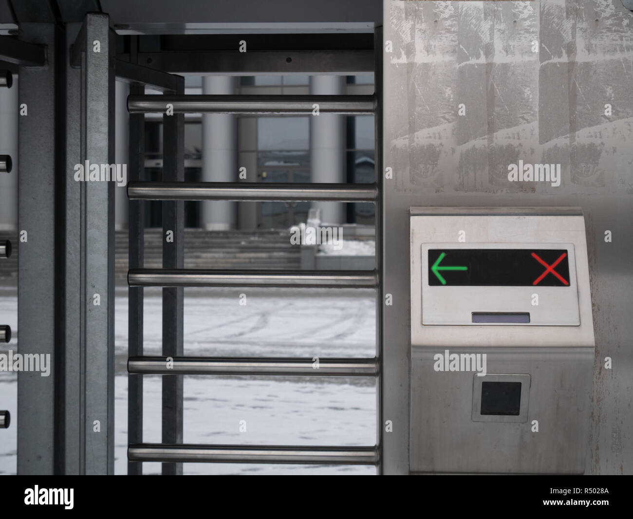 close up shot of electronic ticket automatic security turnstile. green ...