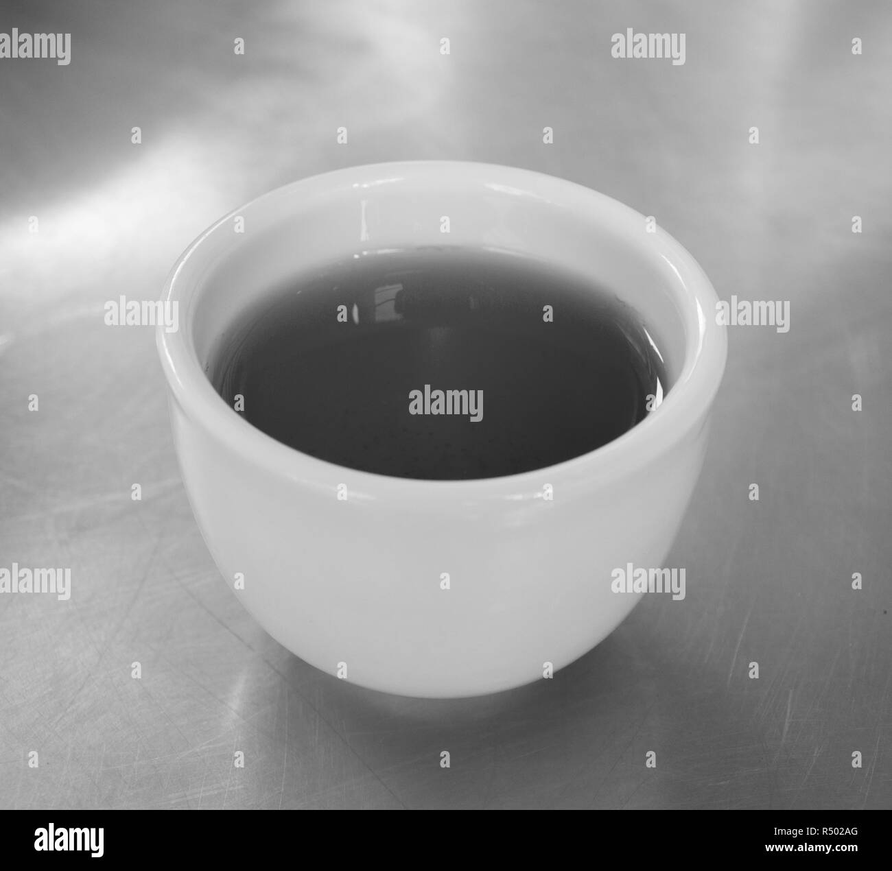 Cup hot tea leaf Black and White Stock Photos & Images - Alamy