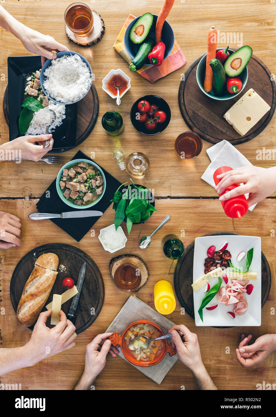 Top view, Group of people sitting at the table having meal Stock Photo ...