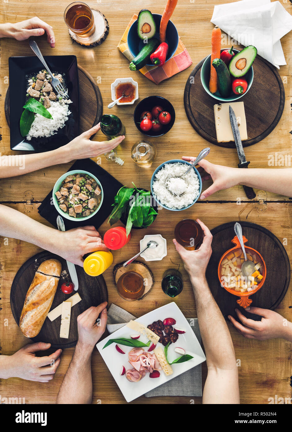 Top view, Group of people sitting at the table having meal Stock Photo ...