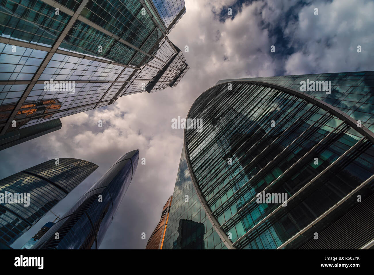 bottom-up view of skyscrapers and flying clouds Stock Photo - Alamy